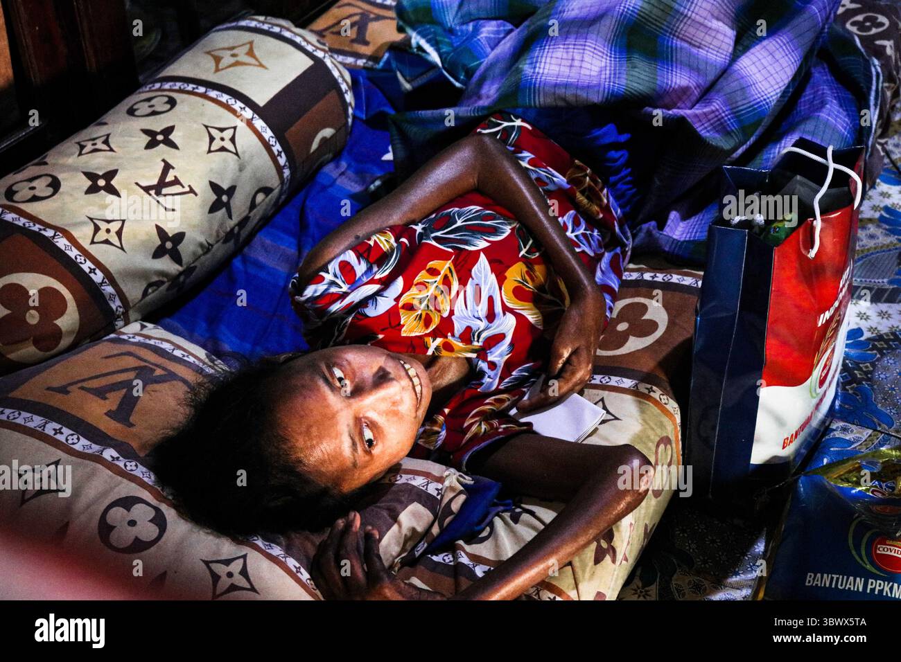 July 23, 2021, Makassar, South Sulawesi, Indonesia: Portrait of a poor ...