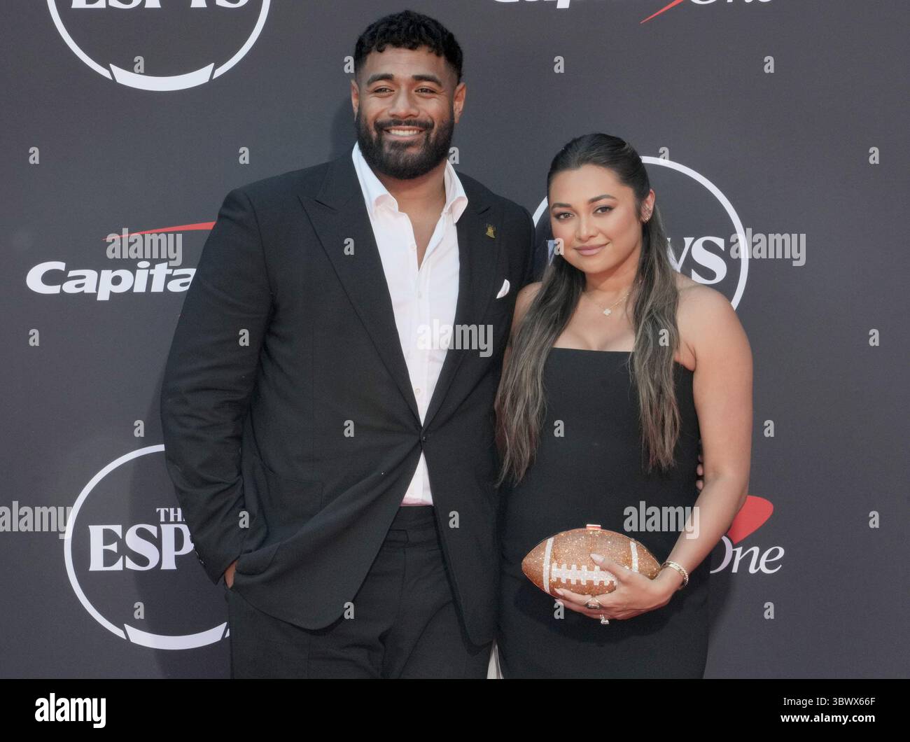 (L-R) Jordan Mailata and Nikki Mailata arrives at The 2025 ESPYS held ...