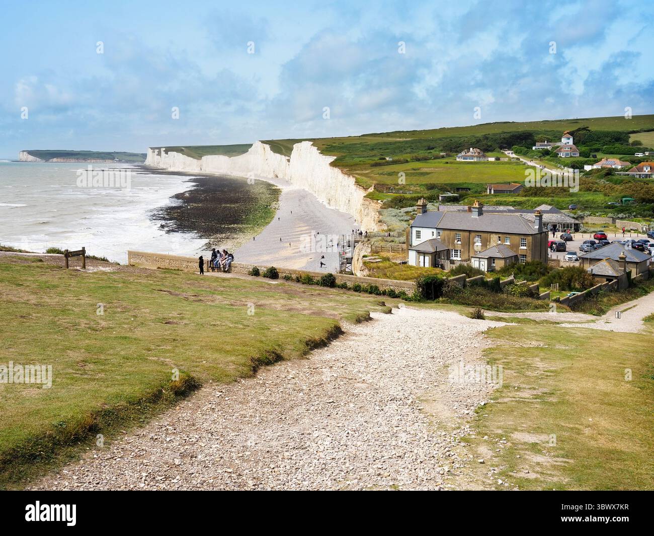 Cliff path descending to Birling Gap with Seven Sisters Cliffs beyond ...