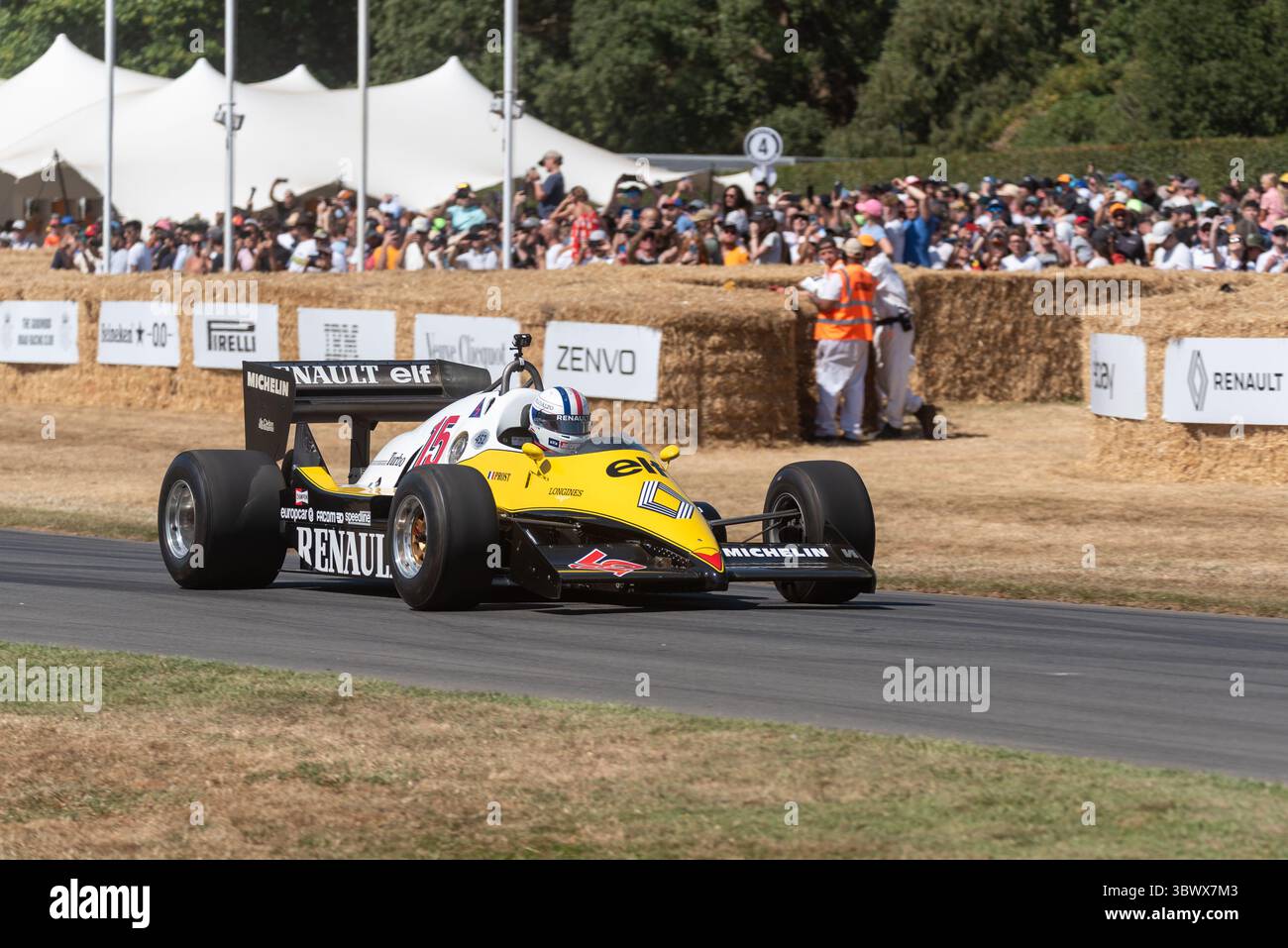 1983 Renault RE40 Formula 1 racing car driving up the hillclimb track ...