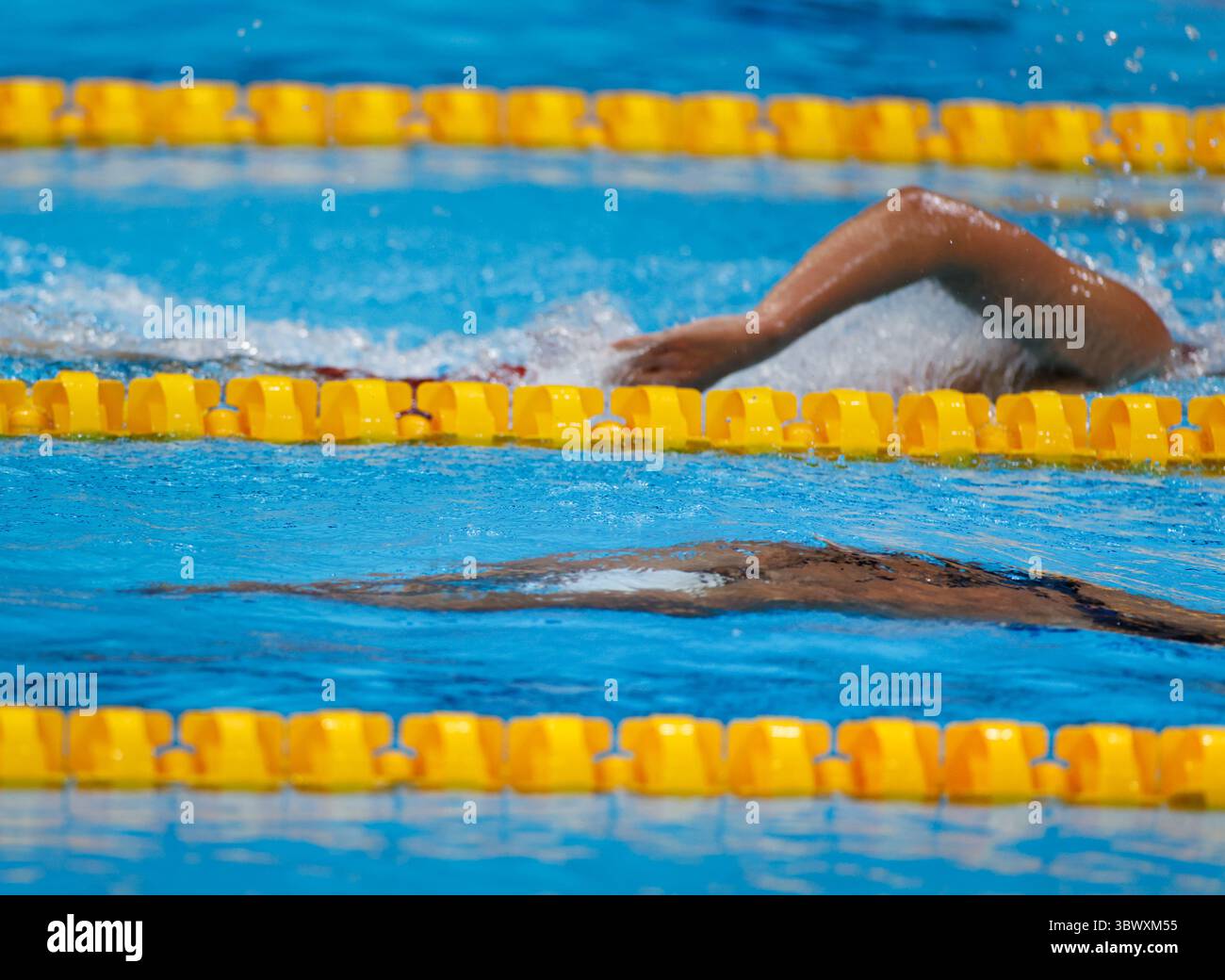 July 26, 2021, Tokyo, Japan: Katie Ledecky pushes off the wall ...