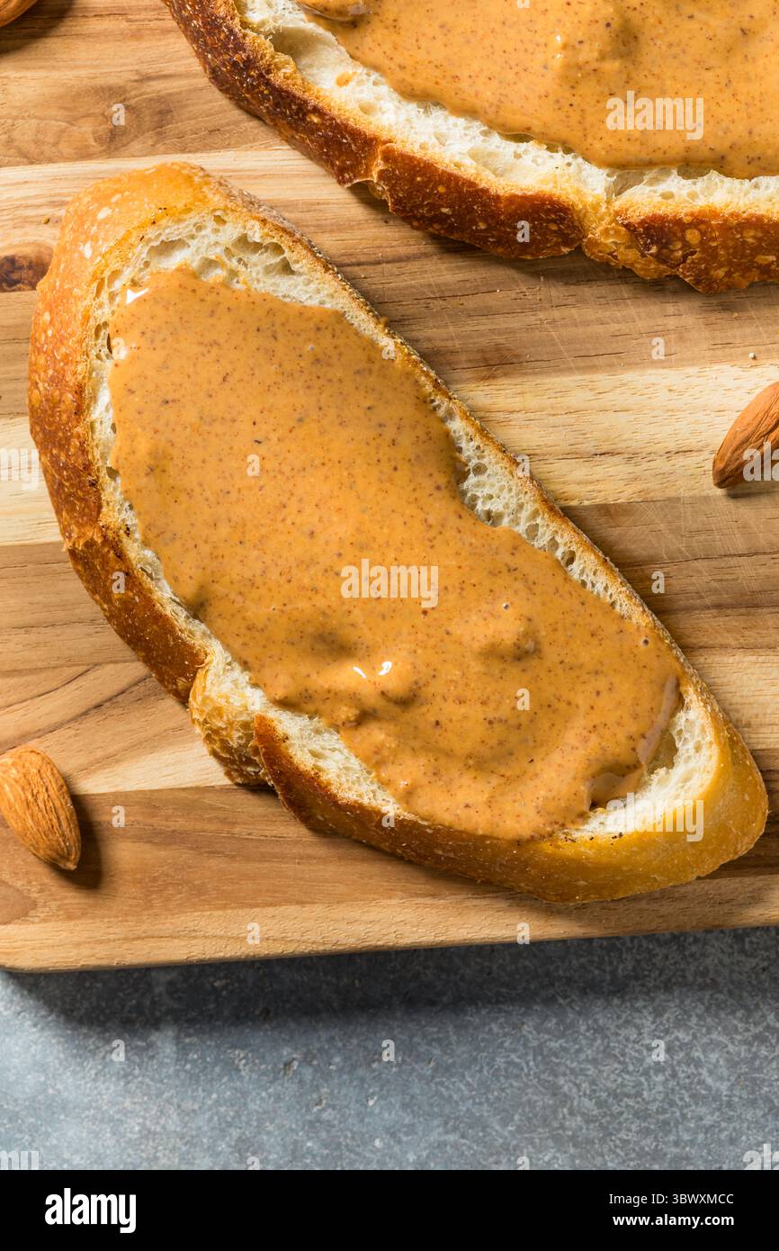 Healthy Homemade Almond Butter on Toast for Breakfast Stock Photo - Alamy