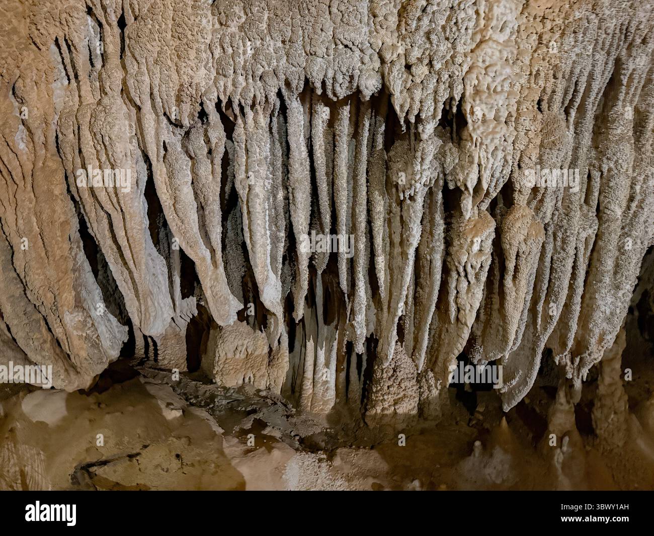 Majestic stalactites and stalagmites inside Ispinigoli Cave ...