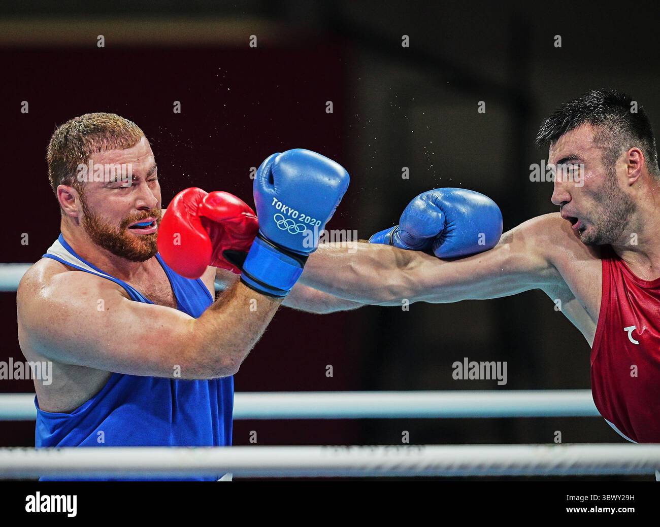 July 29, 2021: Bakhodir Jalolov from Uzbekistan and Mahammad Abdullayev ...