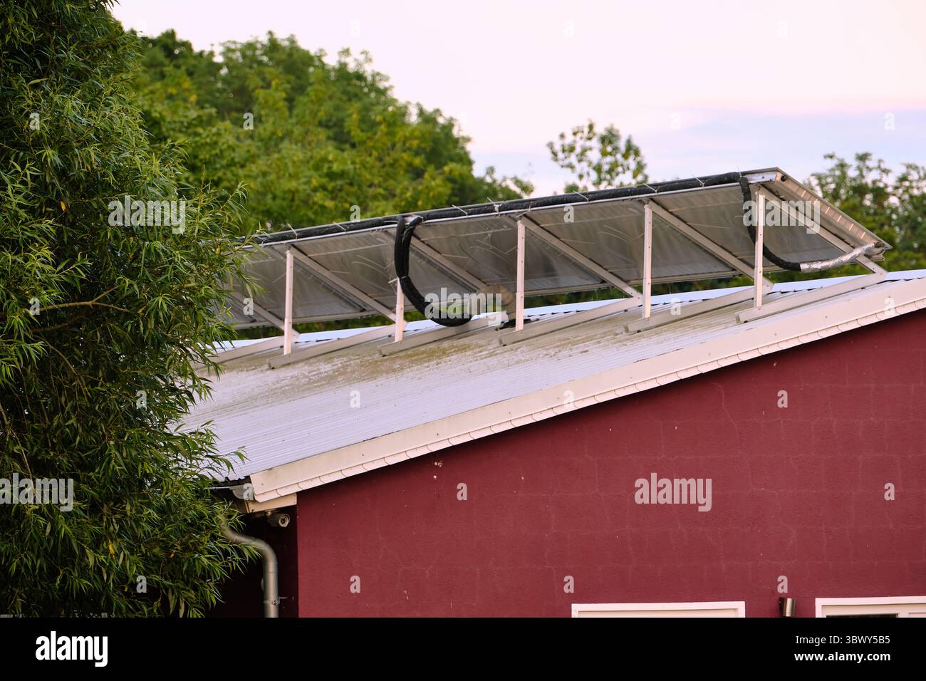 May 5, 2025 - Lauterbach-Germany: Utility building with solar thermal ...