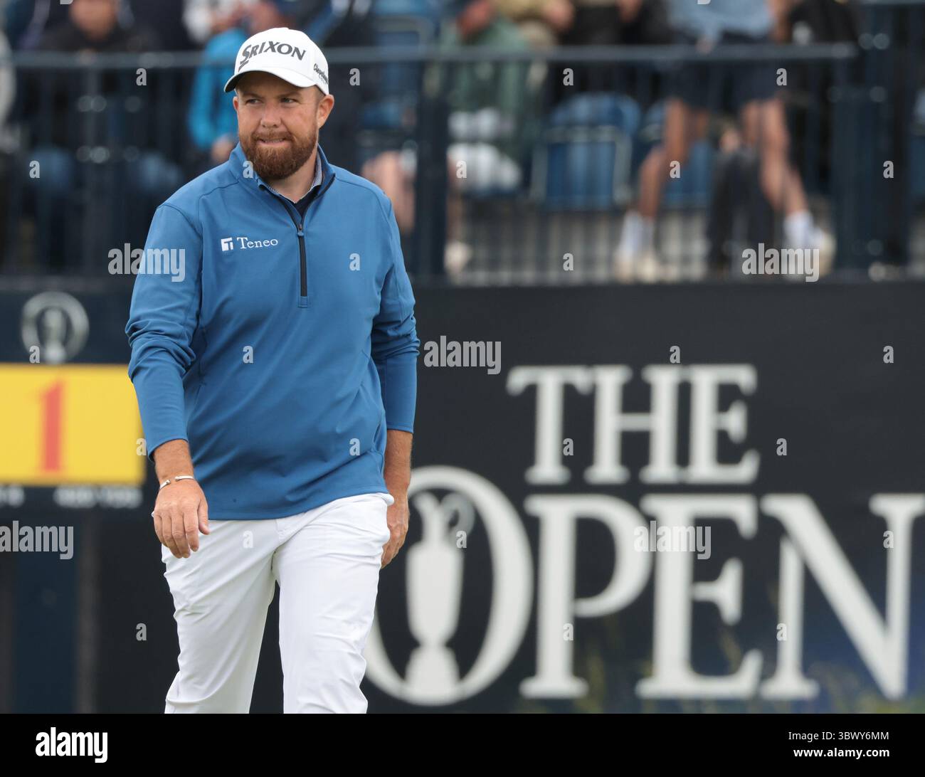 Ireland's Shane Lowry walks up the 1st fairway during the first round ...