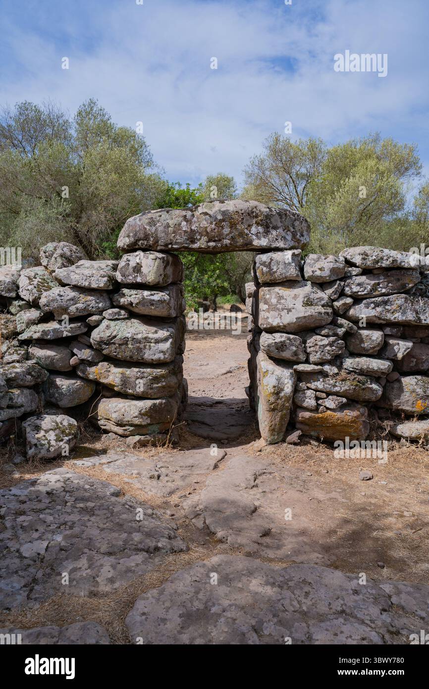 Remains of prehistoric stone huts in the Nuragic village of Serra ...