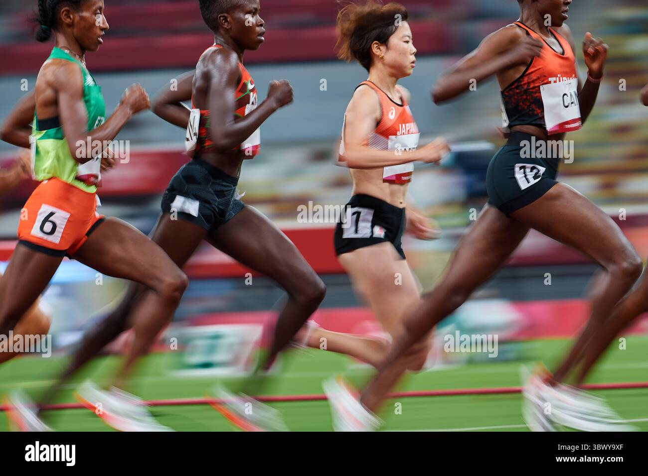 July 30, 2021, Tokyo, Kanto, Japan: Runners in motion competing in the ...