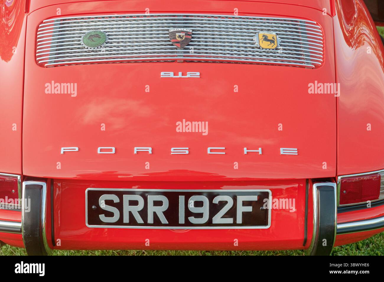 An orange Porsche 912 classic car at a classic vehicle show in ...