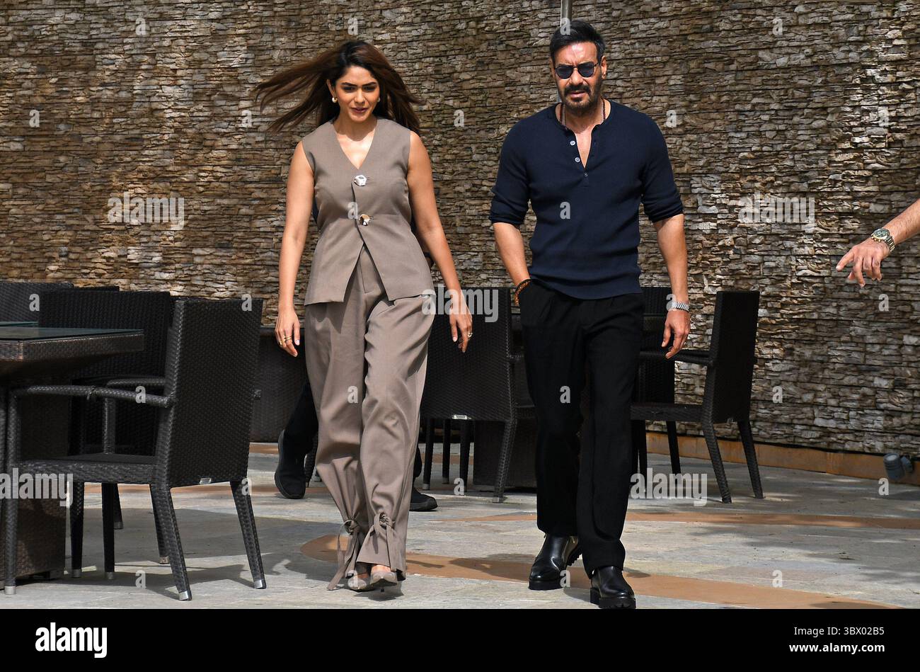 From L-R Bollywood actress and actor, Mrunal Thakur and Ajay Devgn ...