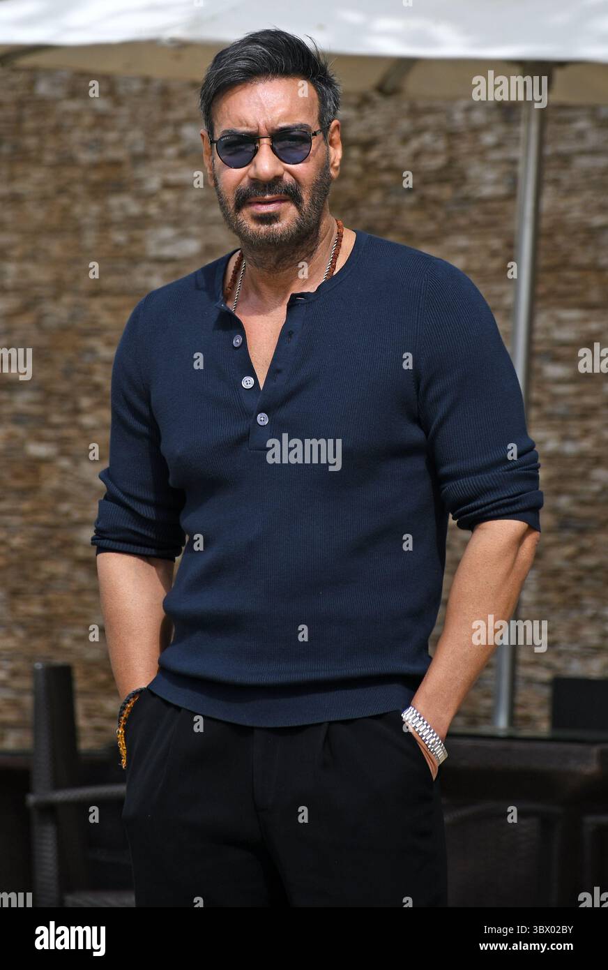 Bollywood actor Ajay Devgn poses for a photo during the promotion of ...
