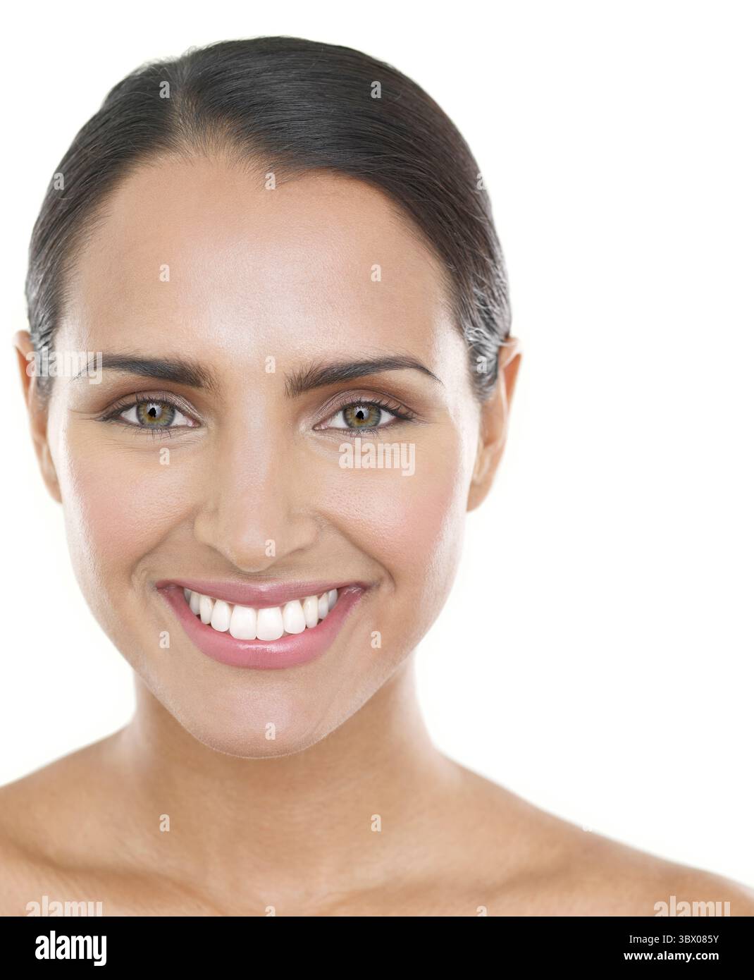 A cheerful portrait of a beautiful Indian woman smiling with radiant ...