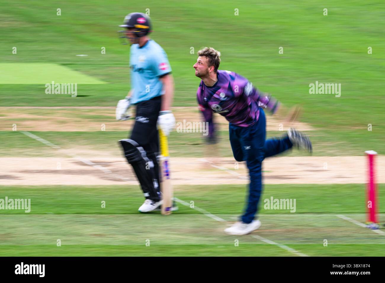 LONDON, UNITED KINGDOM. July 16: Luke Hollman of Middlesex (right) in ...