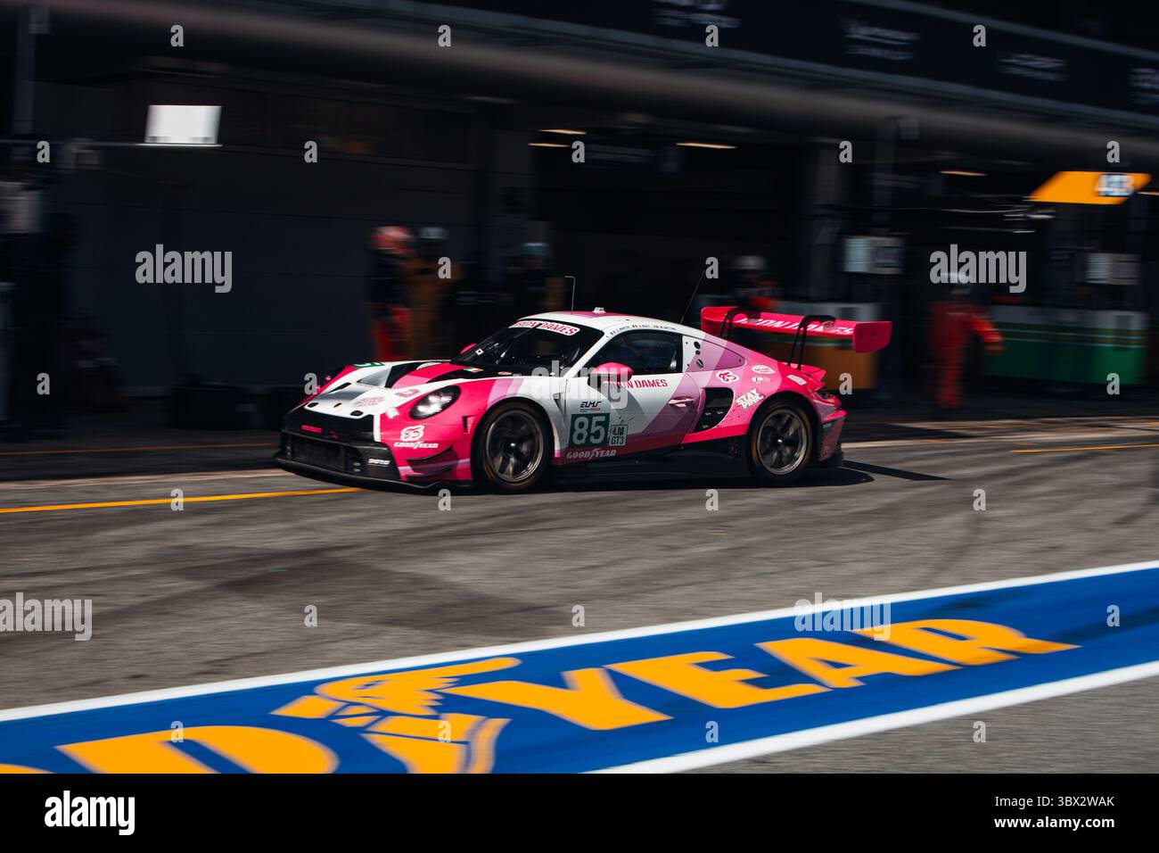 Porsche 911 GT3 Cup on the pit lane during pit stop and tyre change ...
