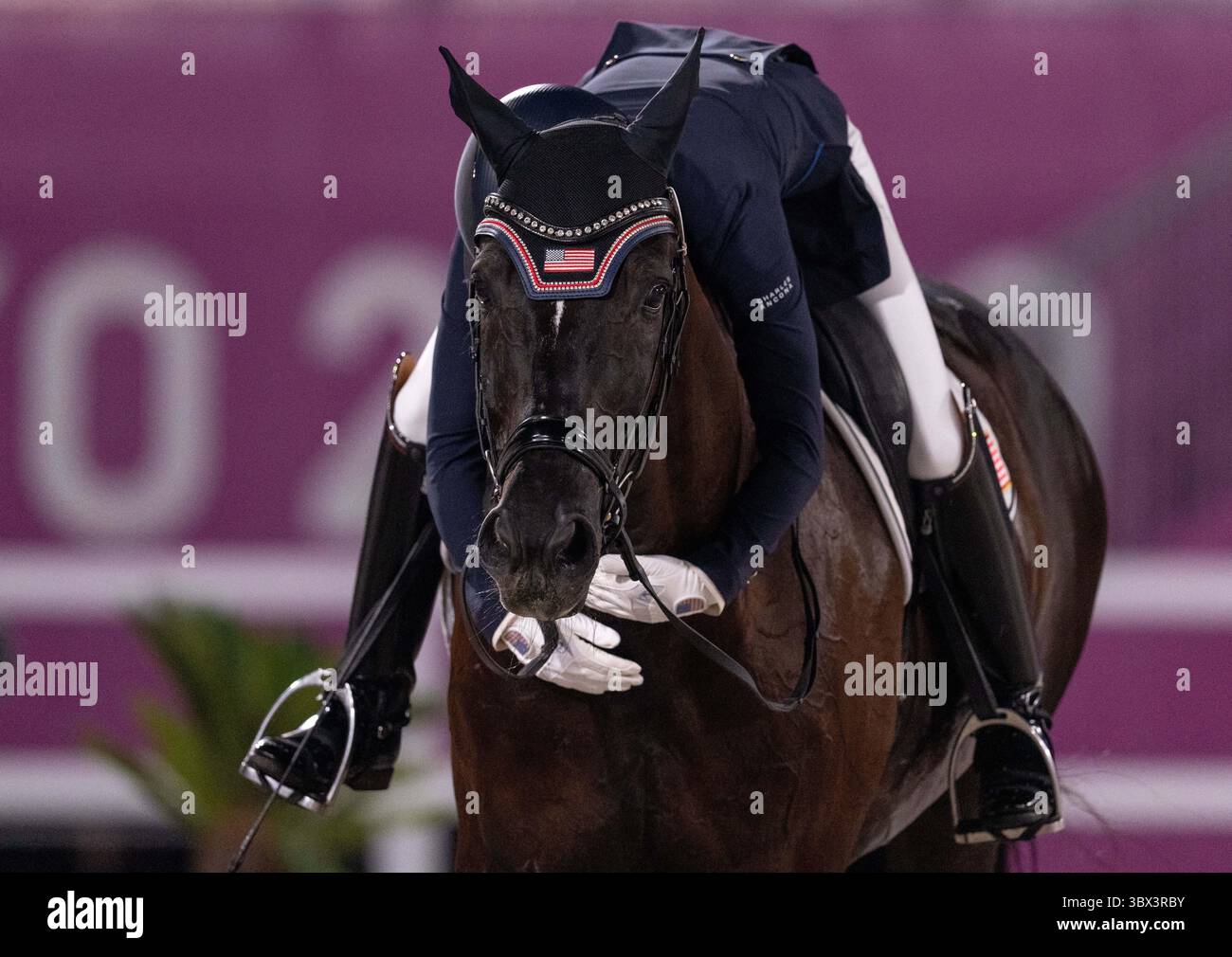 August 26, 2021, Tokyo, Japan: Kate Shoemaker USA hugs her horse ...