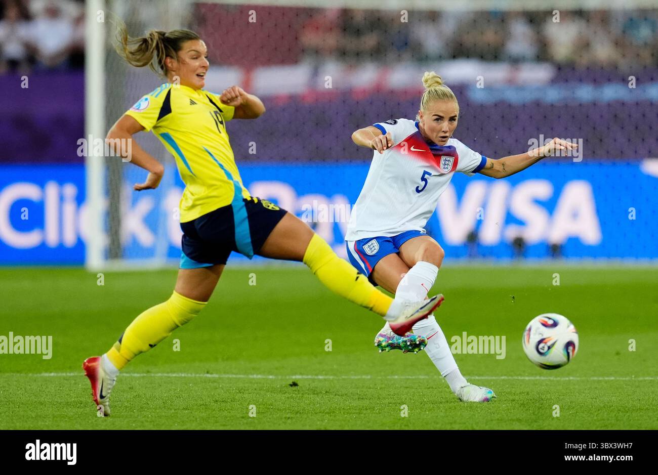 Sweden's Johanna Rytting Kaneryd (left) and England's Alex Greenwood in ...