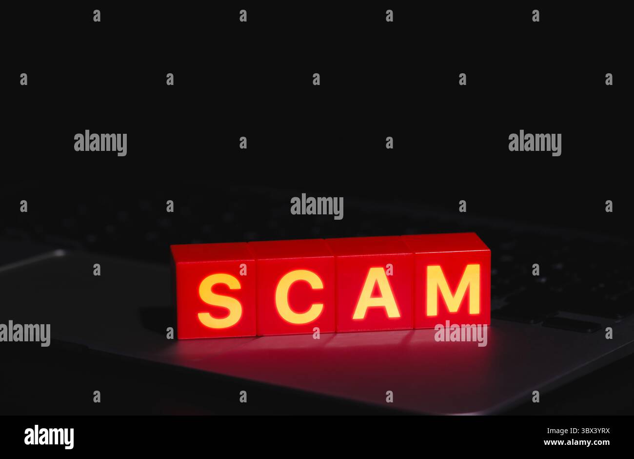 Red Scam Blocks Highlighting Cyber Fraud. Spelling SCAM placed on ...