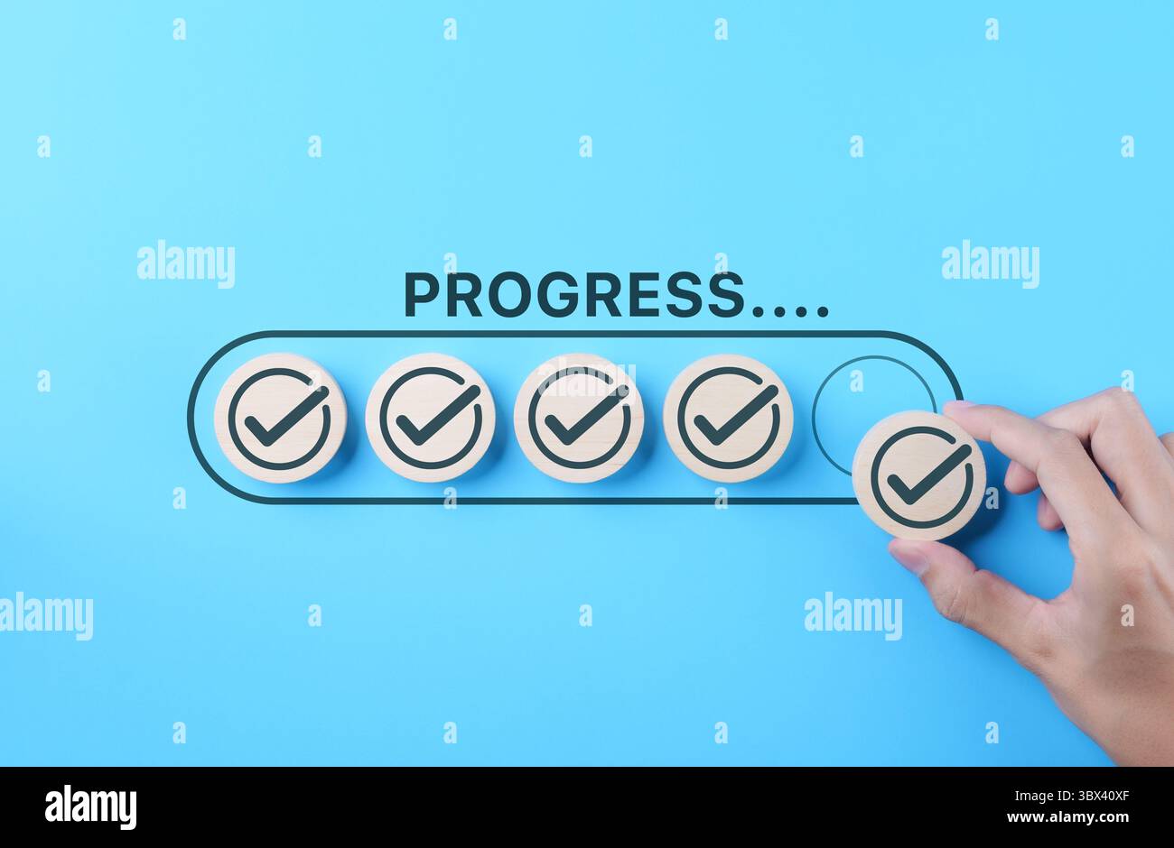 Checklist and task progress tracking concept. A hand placed the final ...
