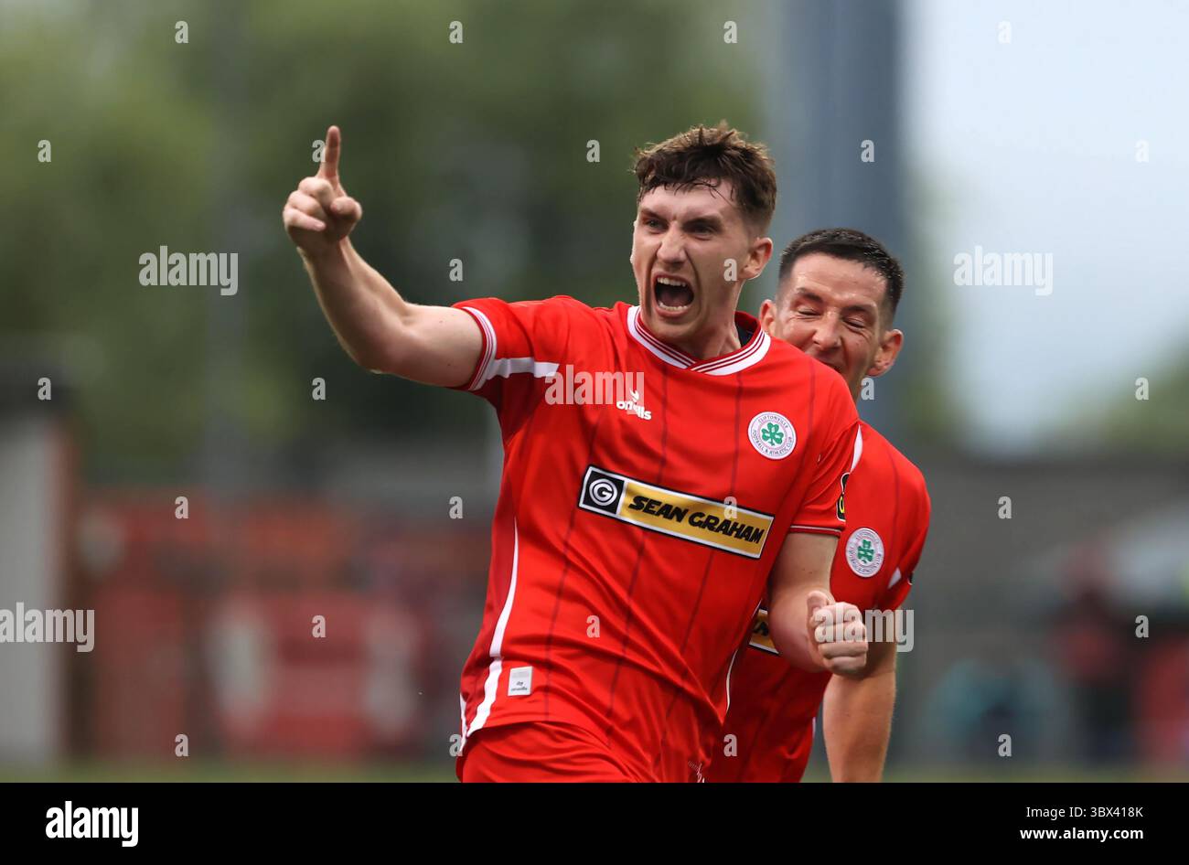Cliftonville's Micheal Glynn celebrates scoring their side's first goal ...