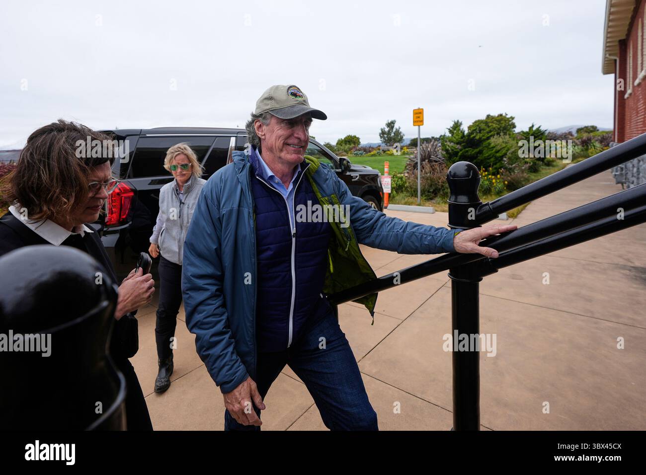 Interior Secretary Doug Burgum, right, visits the Presidio Visitor ...