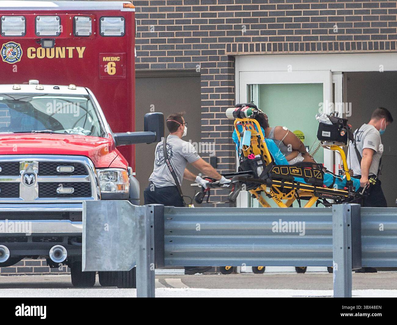 August 27, 2021: Orange County Fire and Rescue Department EMS workers ...