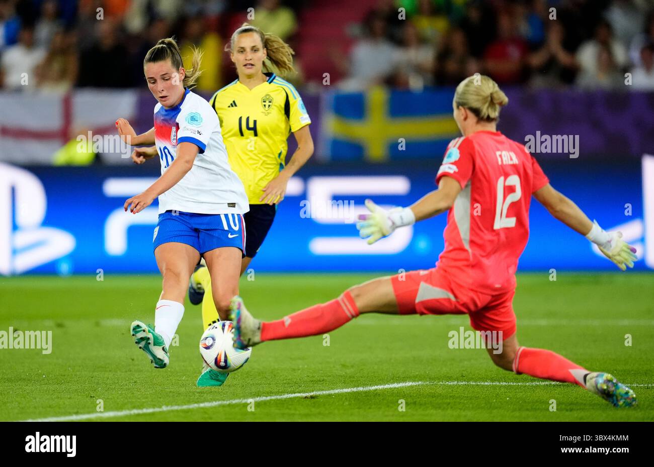 England's Ella Toone (left) has a shot saved by Sweden goalkeeper ...