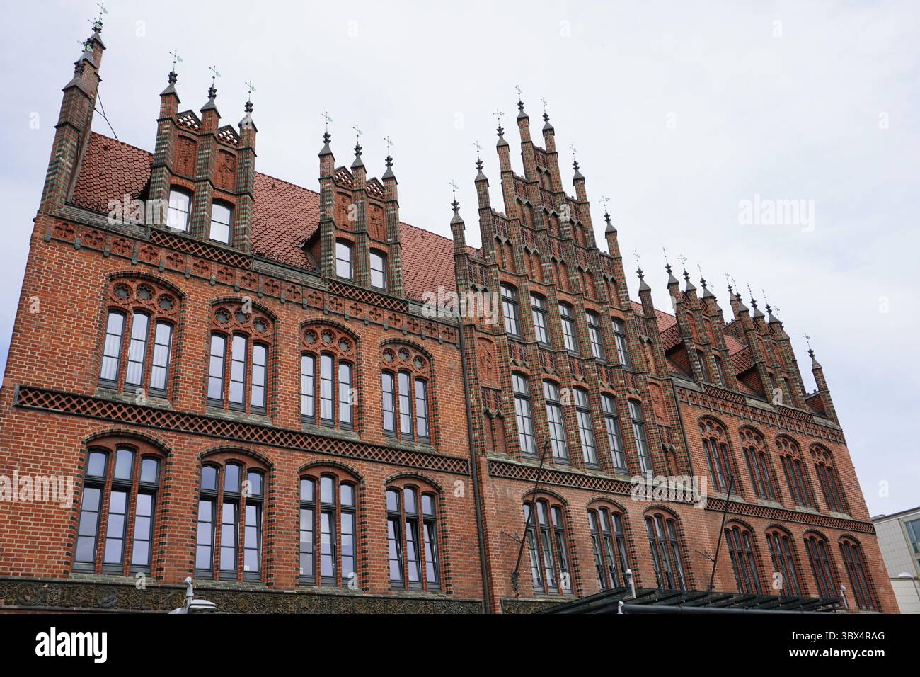 The landmark brick Gothic facade of the old town hall of Hanover ...