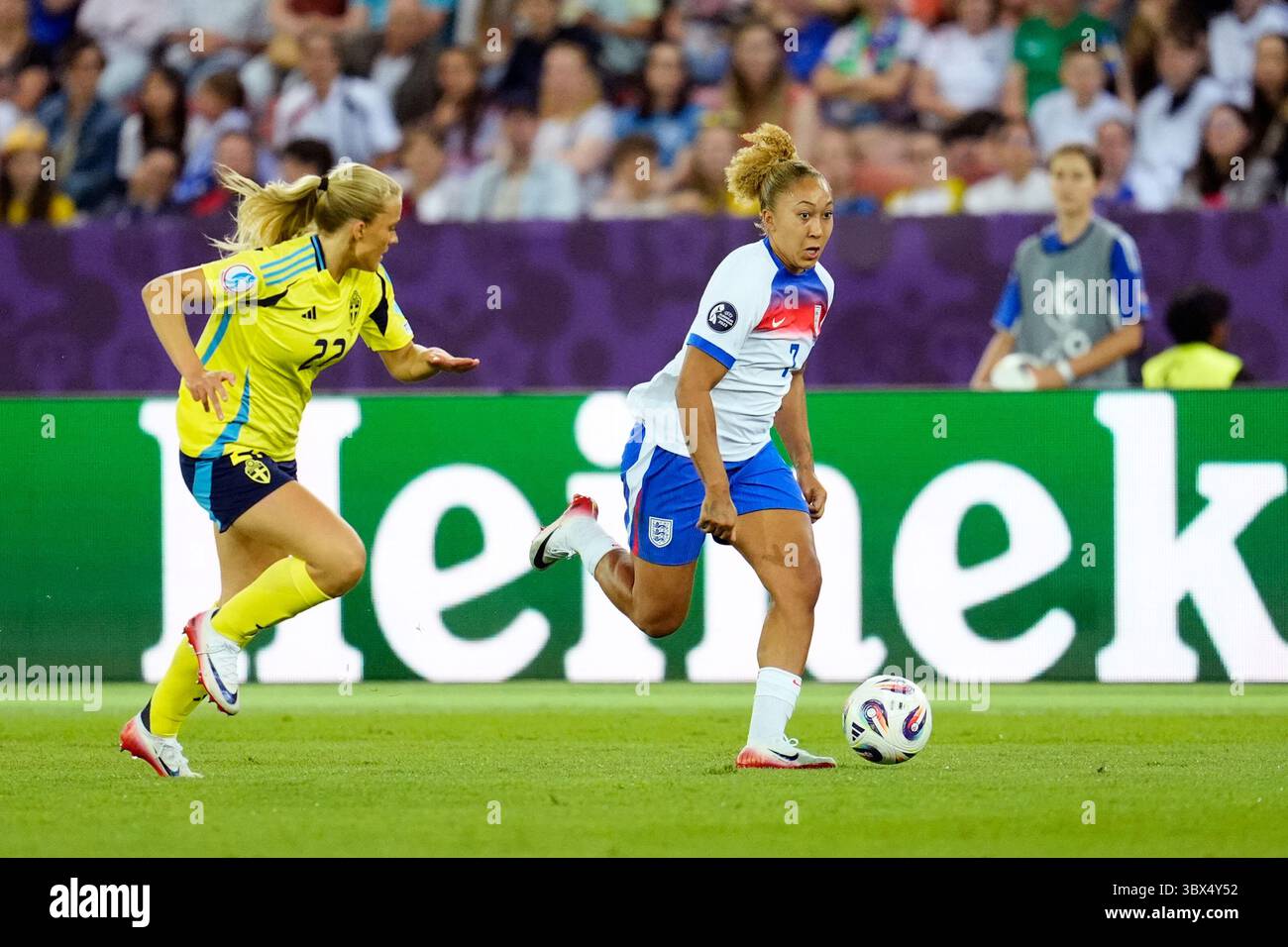 Sweden's Smilla Holmberg (left) and England's Lauren James in action ...