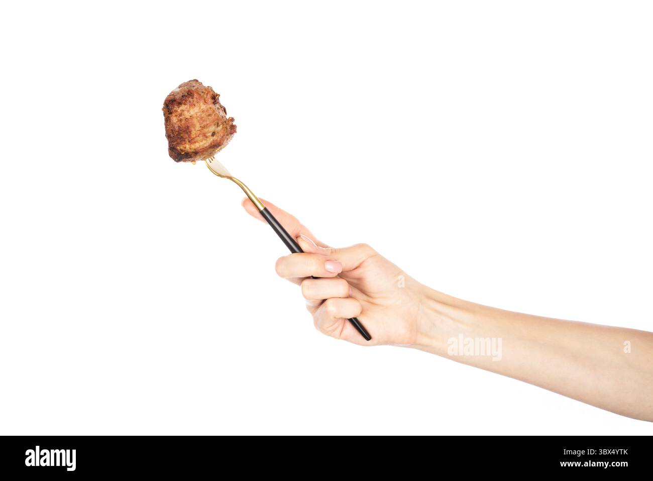 Grilled meat in female hand on fork isolated on white background Stock ...