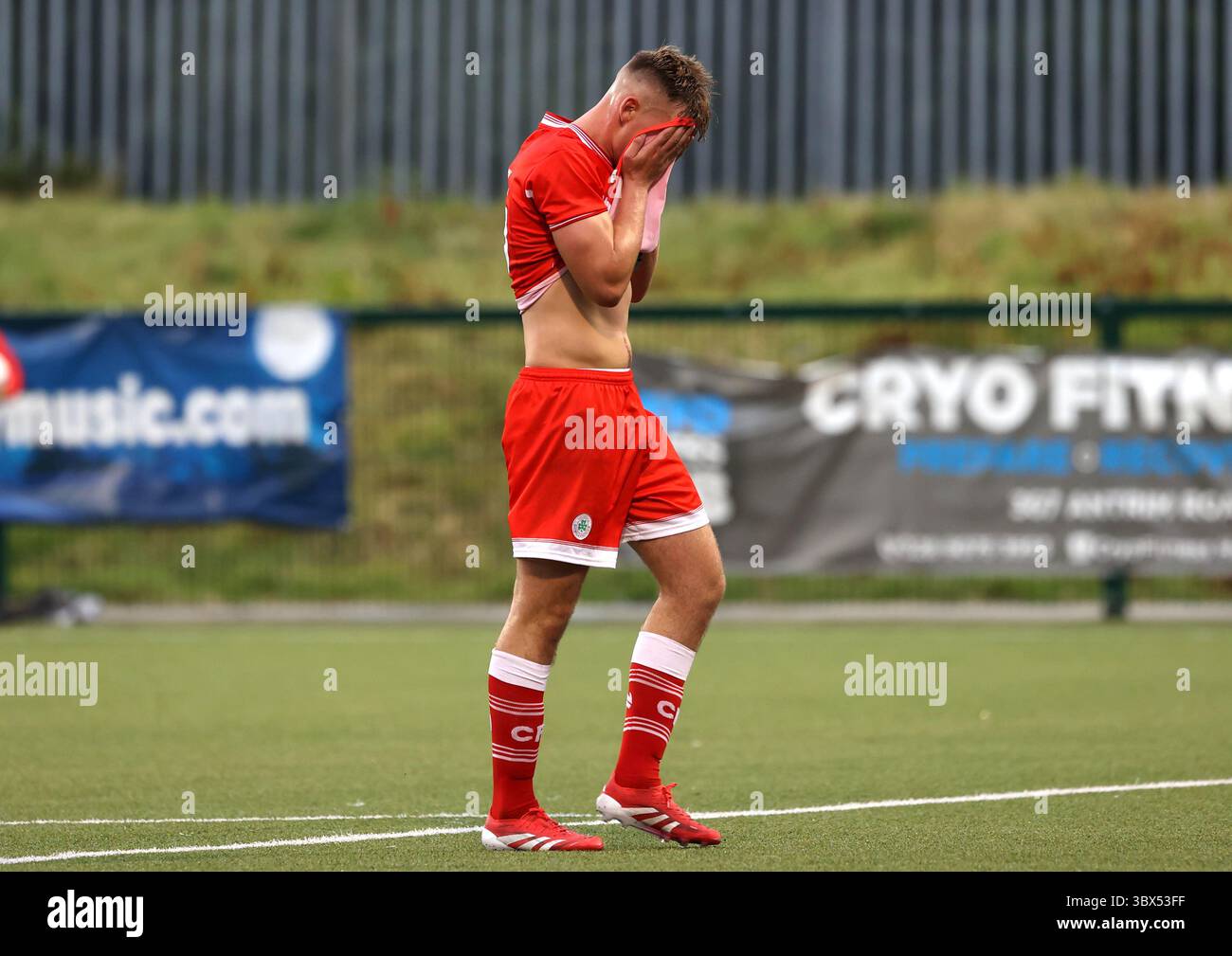Cliftonville's Odhran Casey walks after being shown a red card during ...