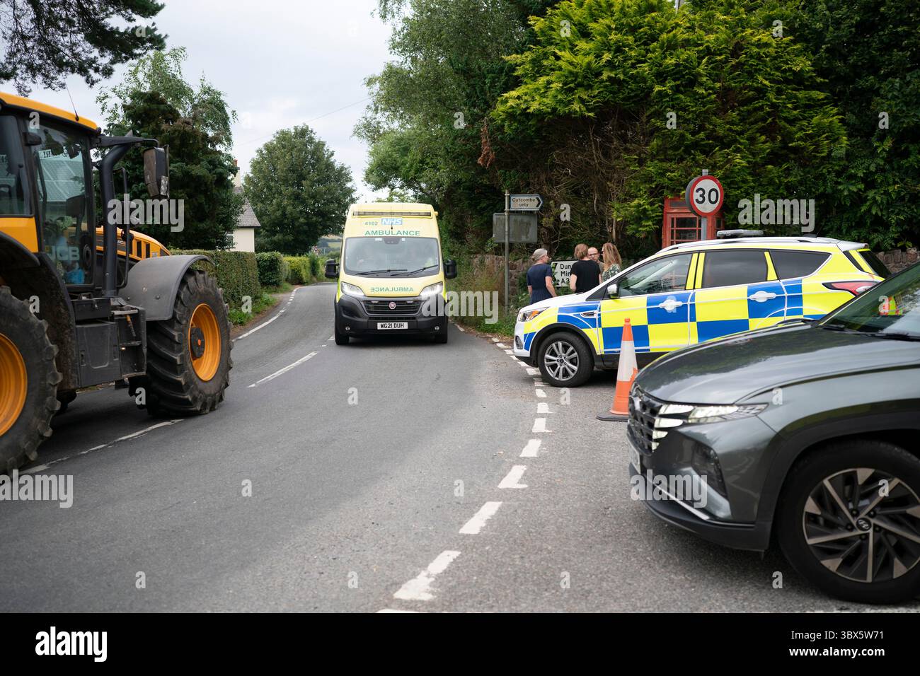 Emergency services near the scene of a bus crash on the A396 Cutcombe ...