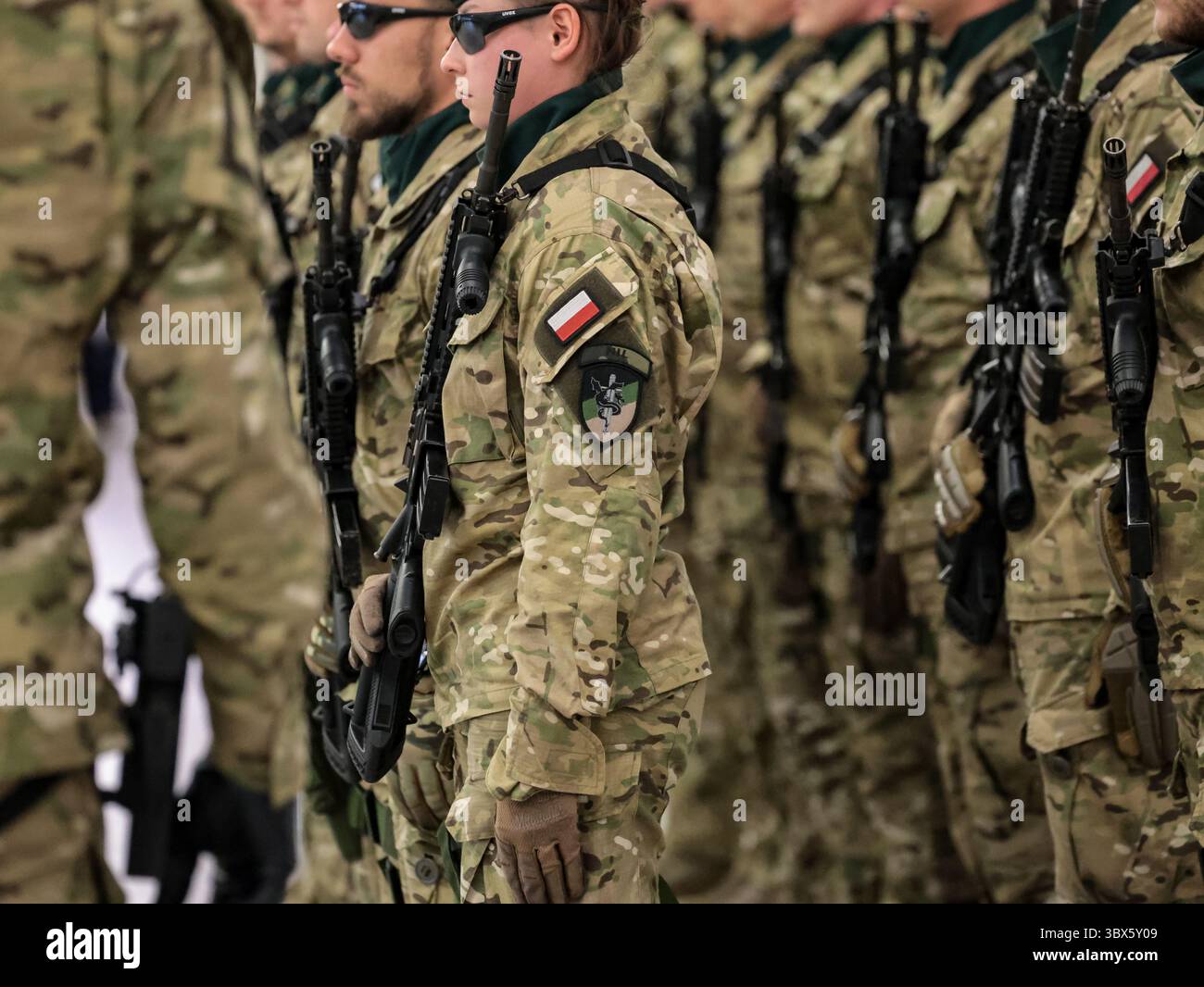 Polish servicemen participate in the ceremony of handover of duties of ...