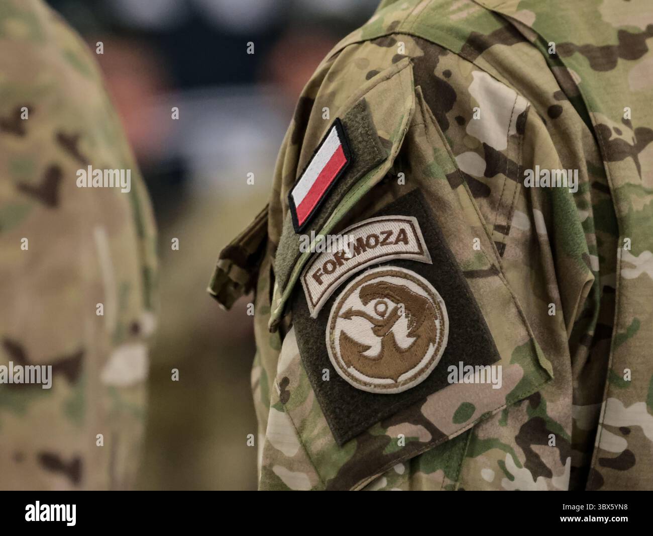 Krakow, Poland. 17th July, 2025. Polish serviceman wears a unifor with ...