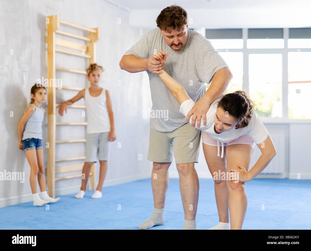 Parents children during training hi-res stock photography and images ...