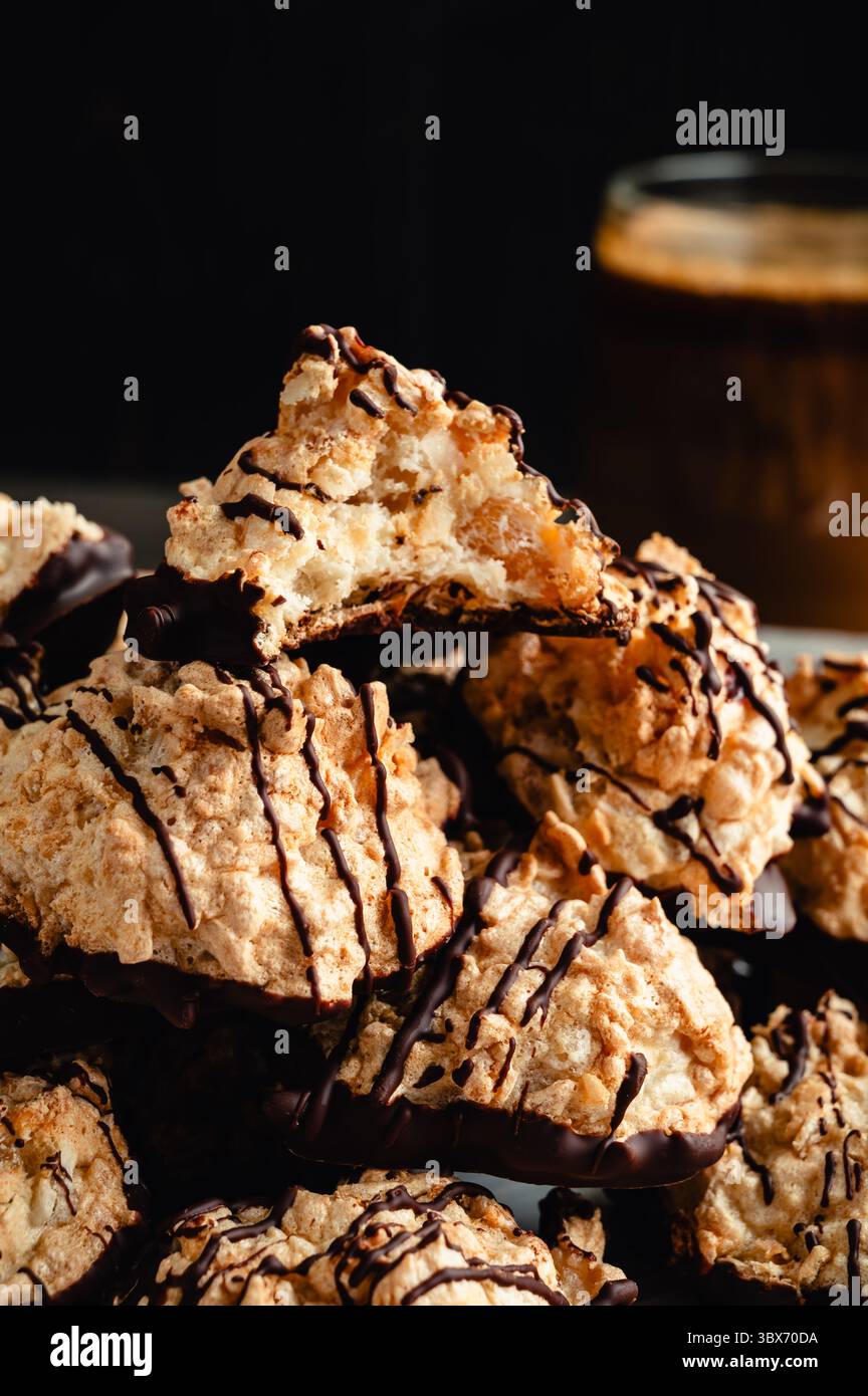 Close-up of a Pile of Macaroons Drizzled in Dark Chocolate: Plate of ...