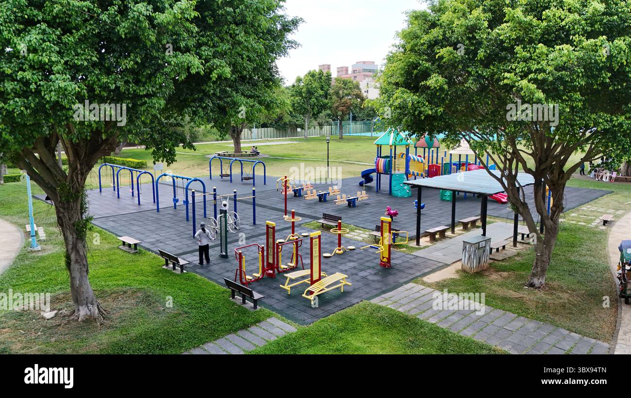 Community Park with Children’s Playground and Fitness Equipment in ...