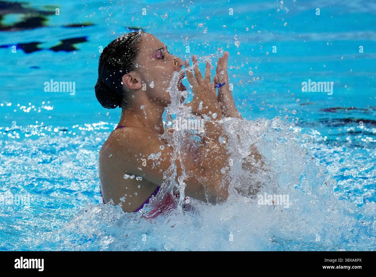 Sabina Makhmudova of Uzbekistan competes in the women's solo technical ...