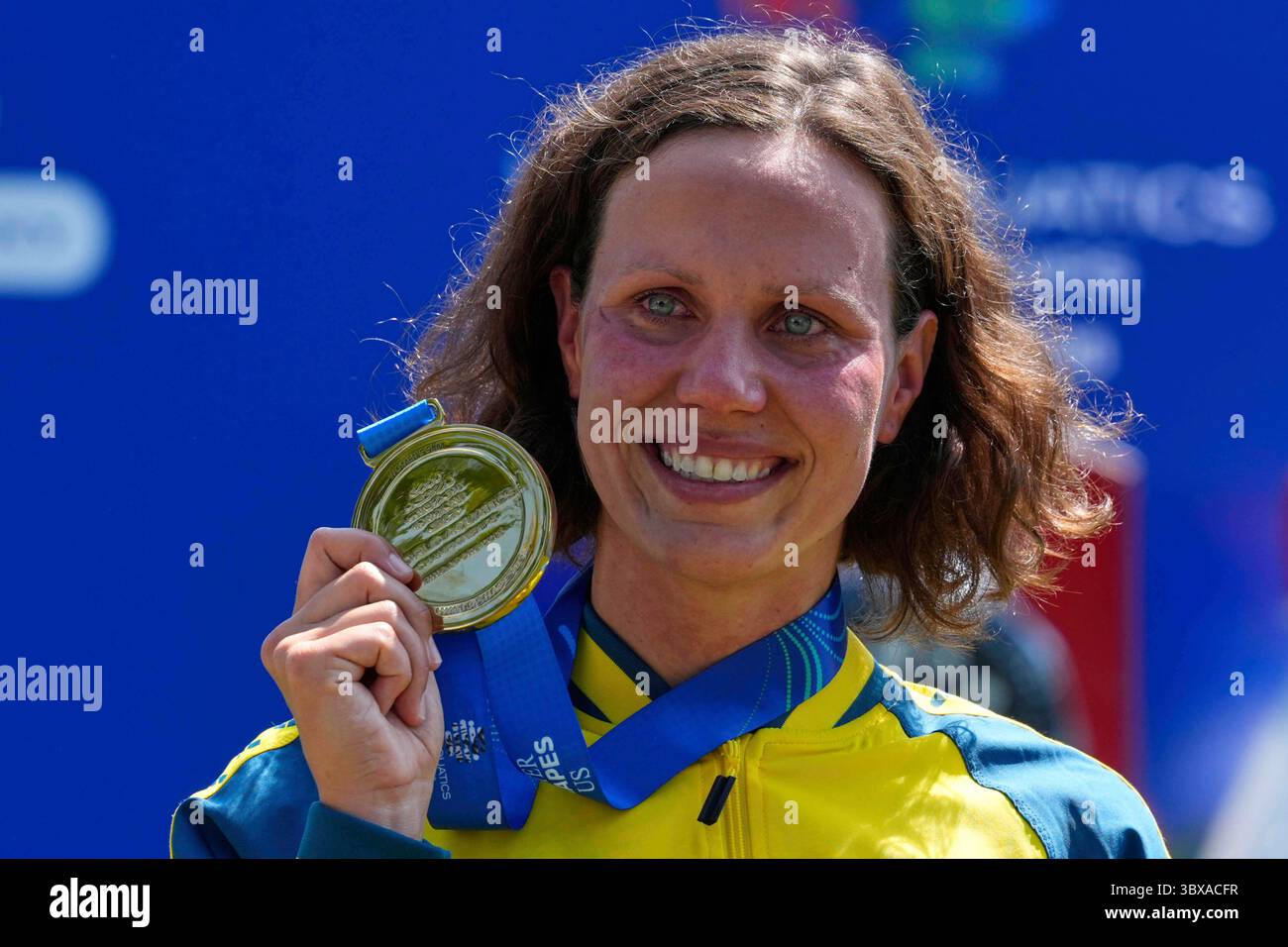 Gold medalist Moesha Johnson of Australia poses on the podium after the ...