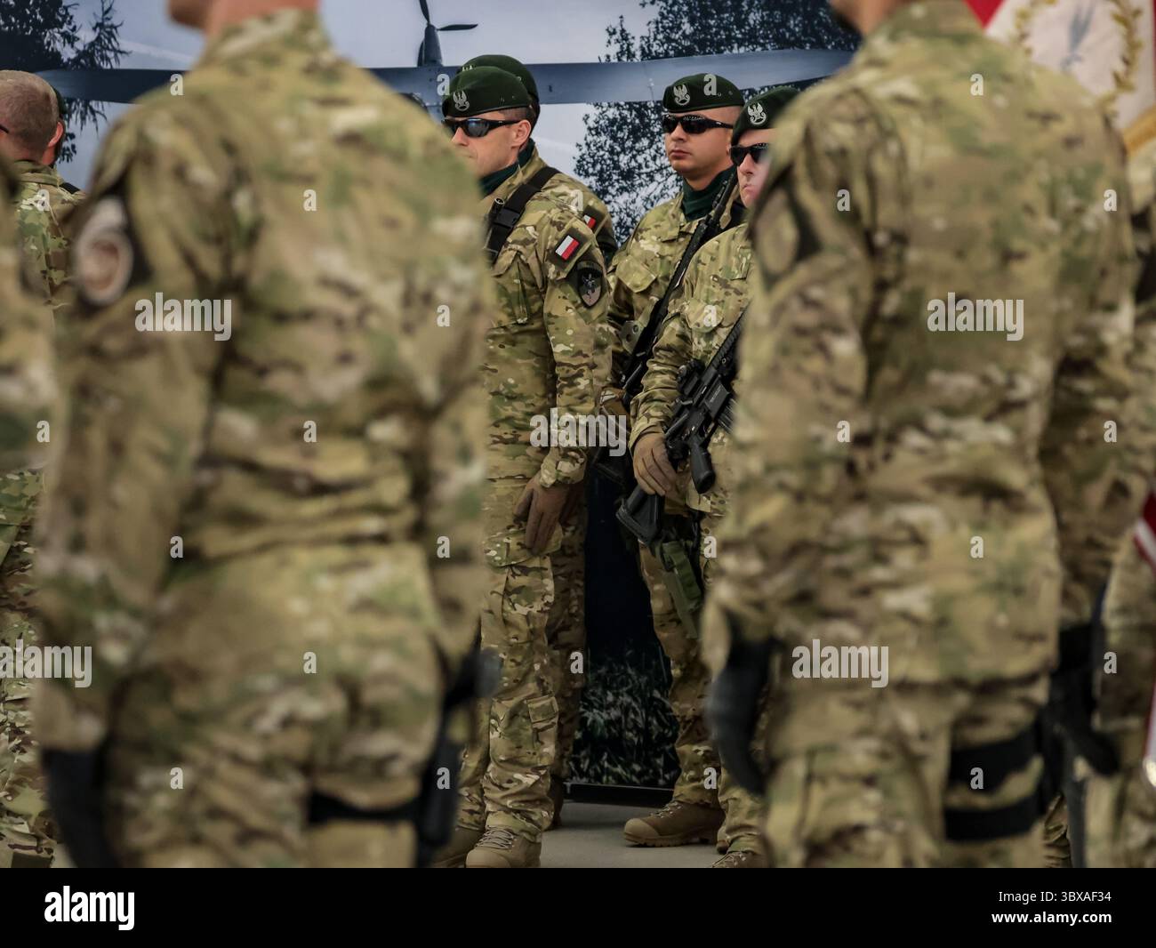 Polish servicemen participate in the ceremony of handover of duties of ...