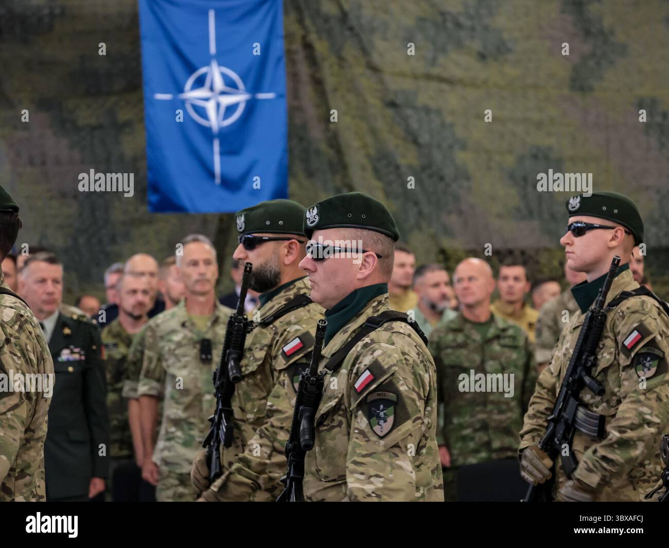 Polish servicemen participate in the ceremony of handover of duties of ...
