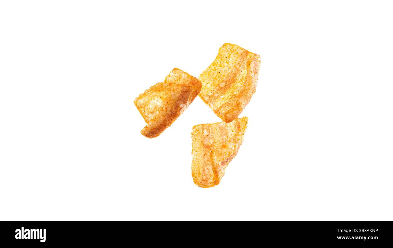 Crispy golden potato chips falling Cut Out Stock Images & Pictures - Alamy
