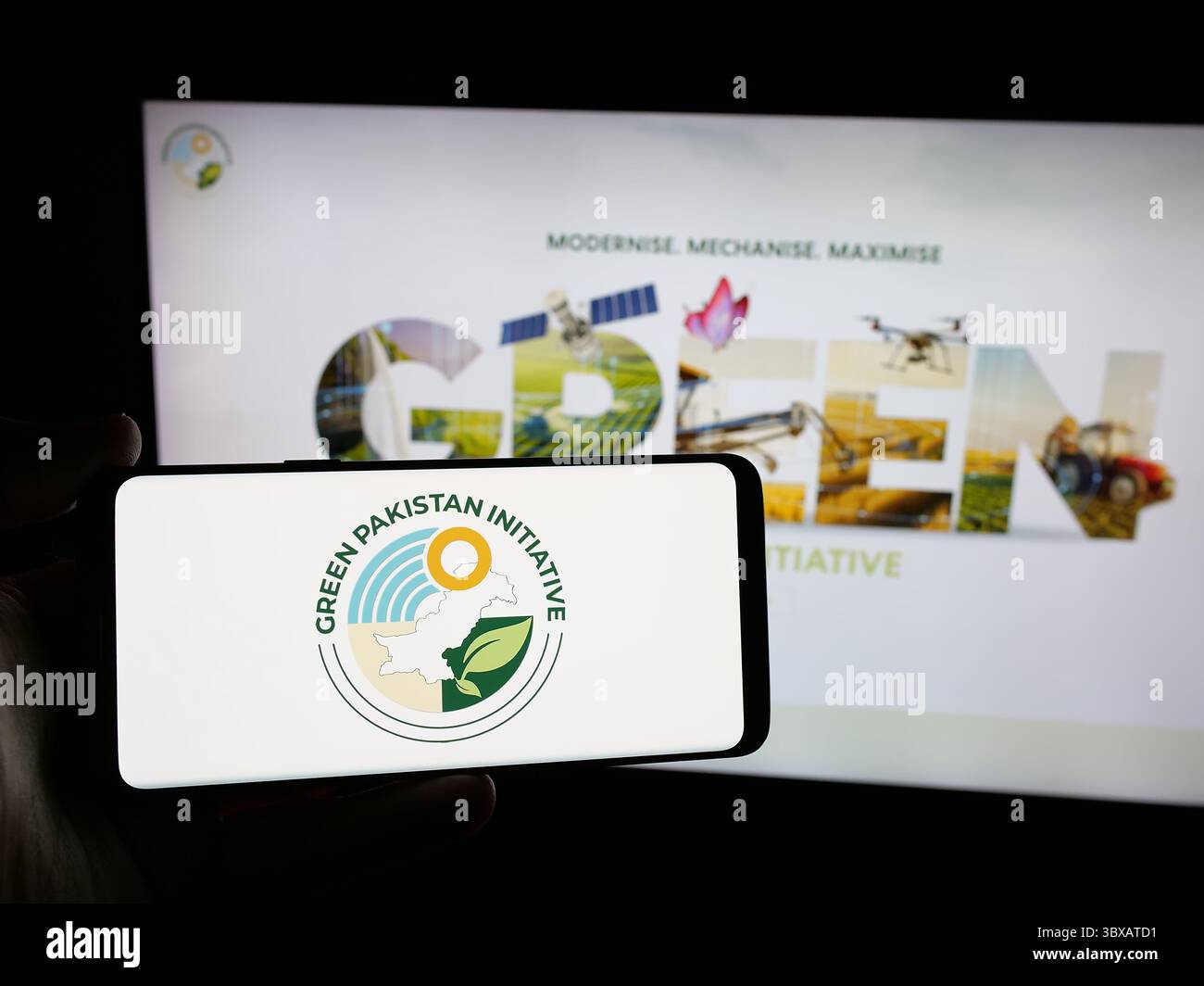 In this photo illustration, a person is holding a smartphone with the ...