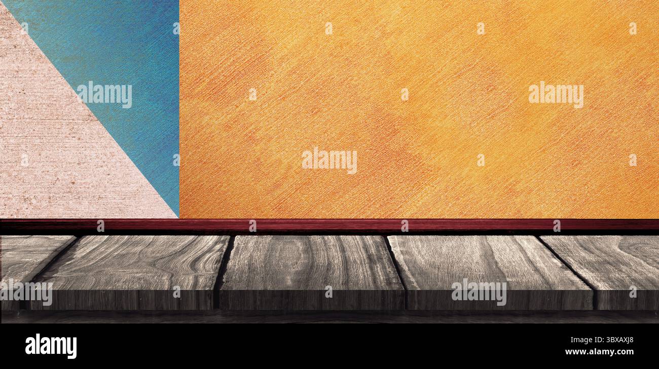 Wooden table on a texture and coloured wall Stock Photo - Alamy