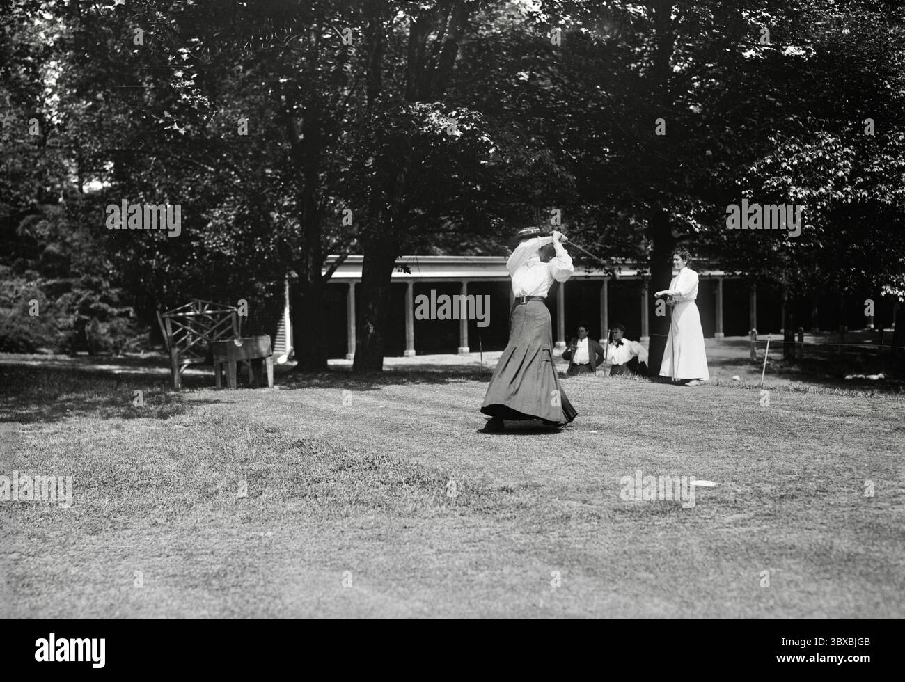 Miss M.L. Harrison, competes at the Essex Country Club golf tournament ...