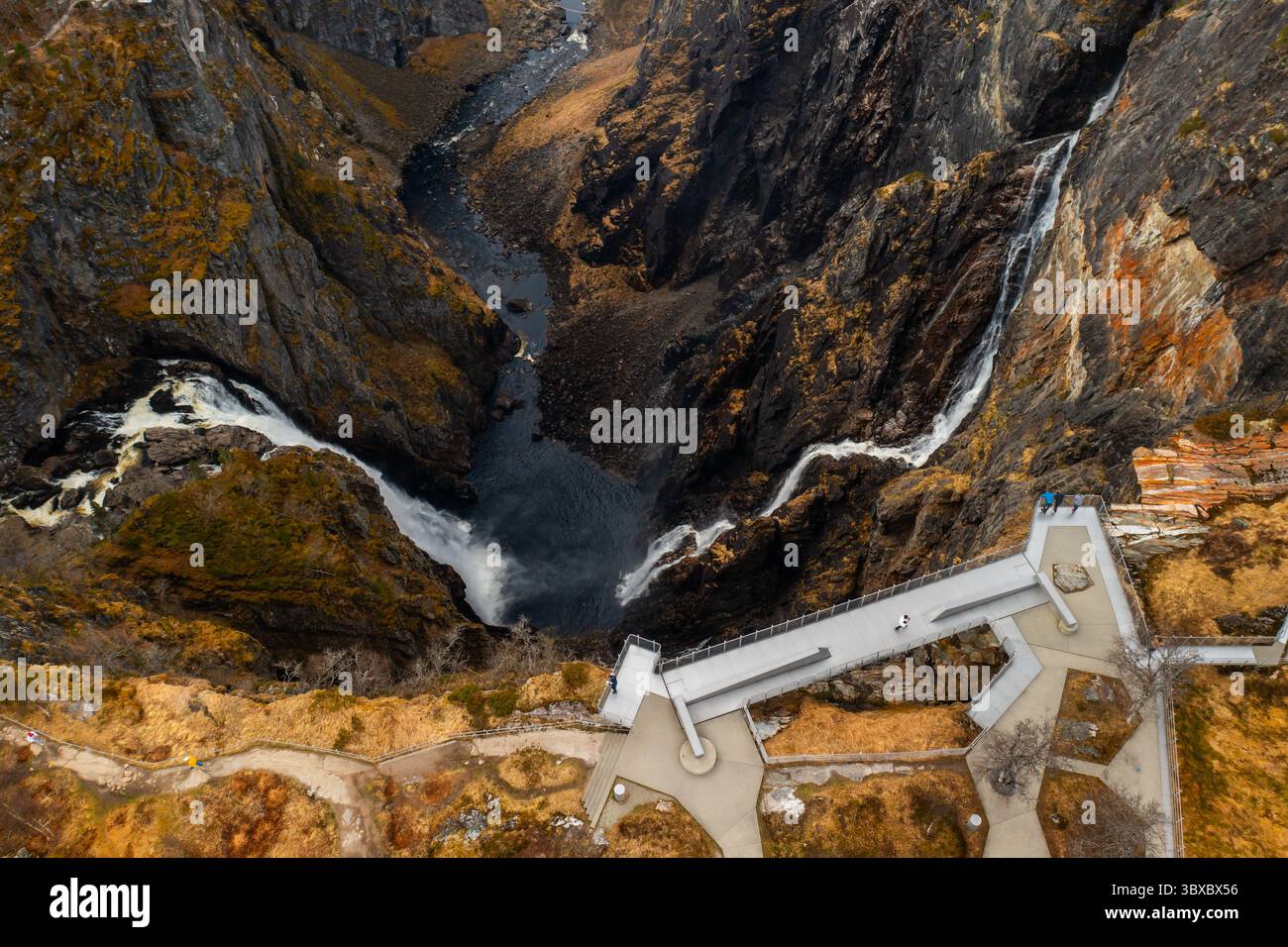 Majestic Voringsfossen waterfall with powerful cascades converging into ...