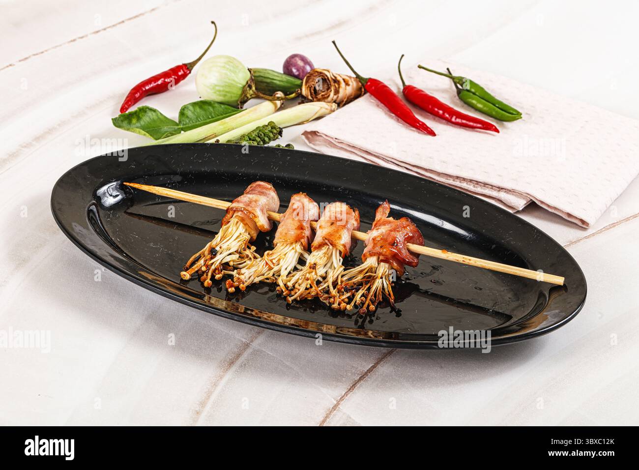 Thai Street foof satay with bacon and mushroom enoki skewer Stock Photo ...
