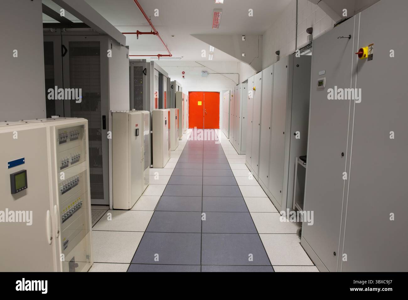 Showing flat design electrical corridor with raised floor tiles ...