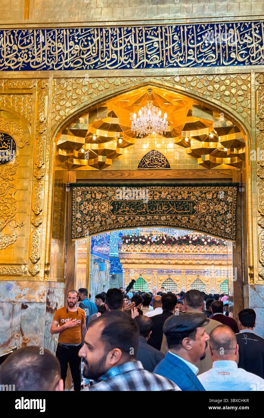 Visitors gather inside the Imam Hussein shrine in Karbala, Iraq ...