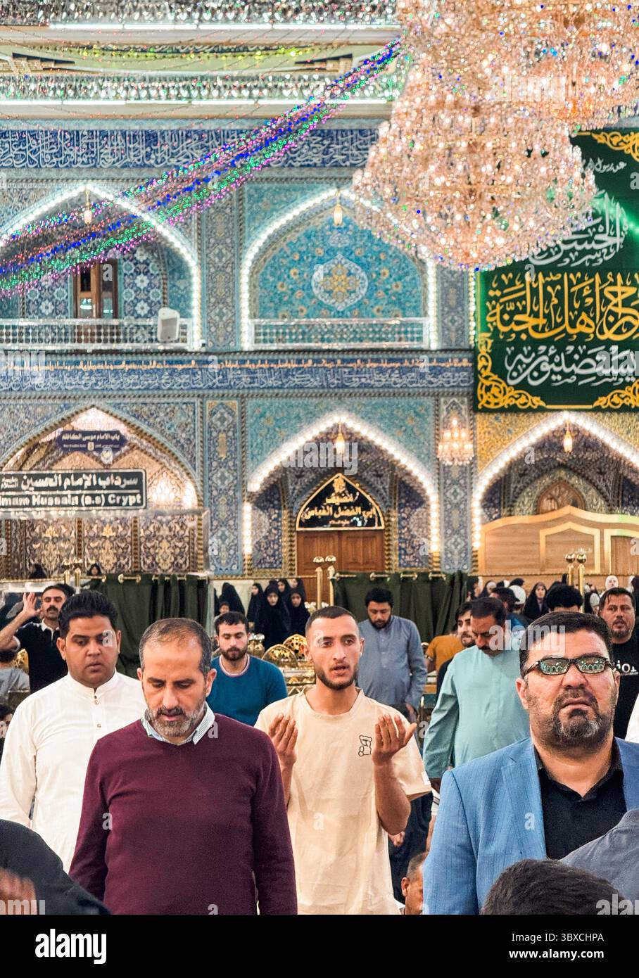 People participate in a spiritual gathering in Karbala, Iraq ...