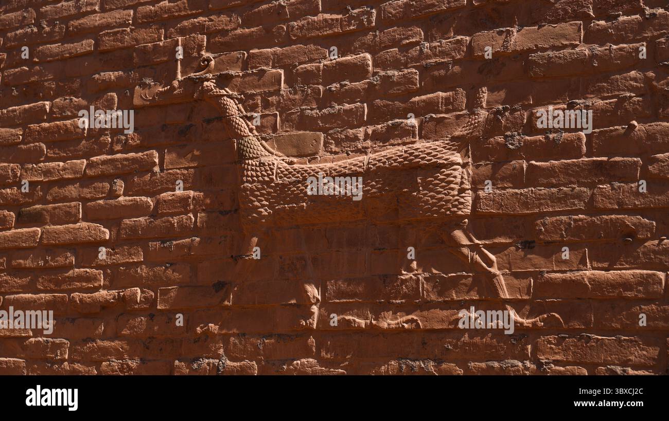 Historic relief of a stag adorning the ancient brick wall in Babylon ...